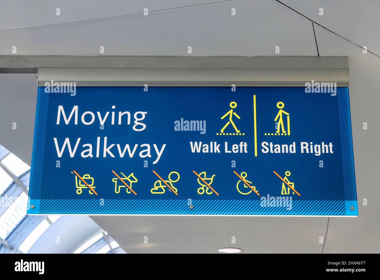 International Airport sign Moving Walkway Walk Left Stand Right in air ...