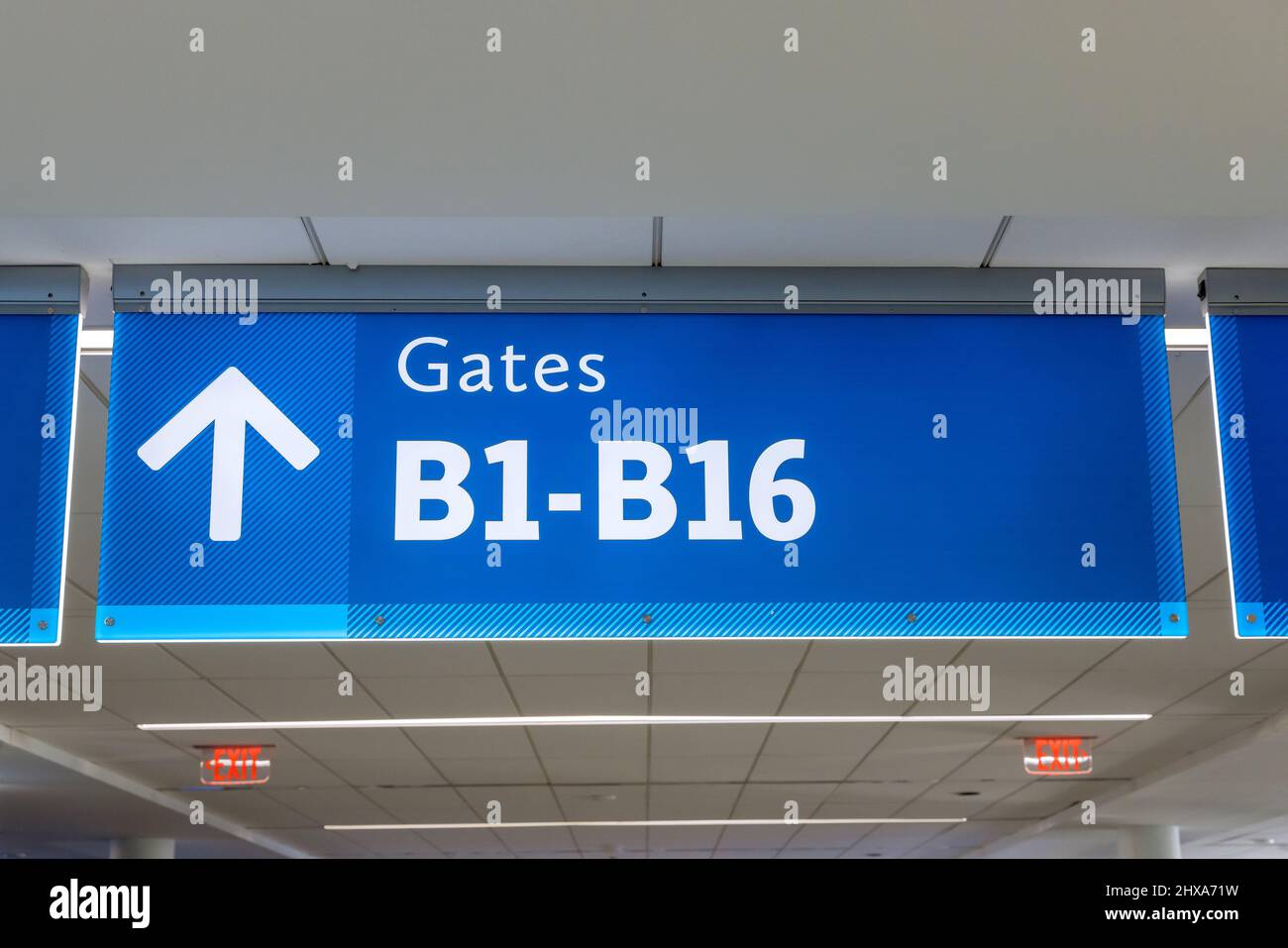International Airport sign Gates B1- B16 in air terminal Stock Photo ...