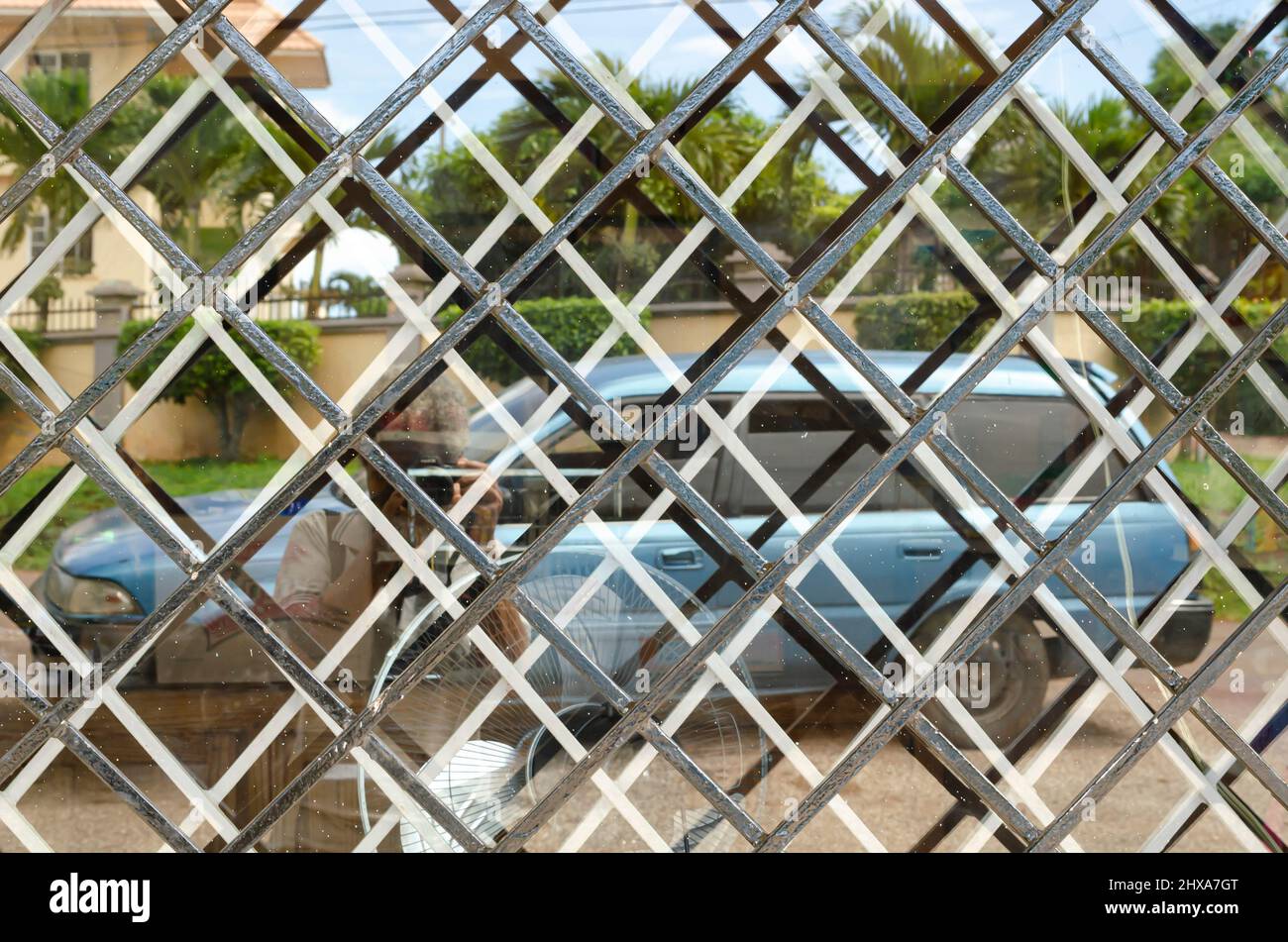Close-up Reflection From Grilled Window Stock Photo - Alamy
