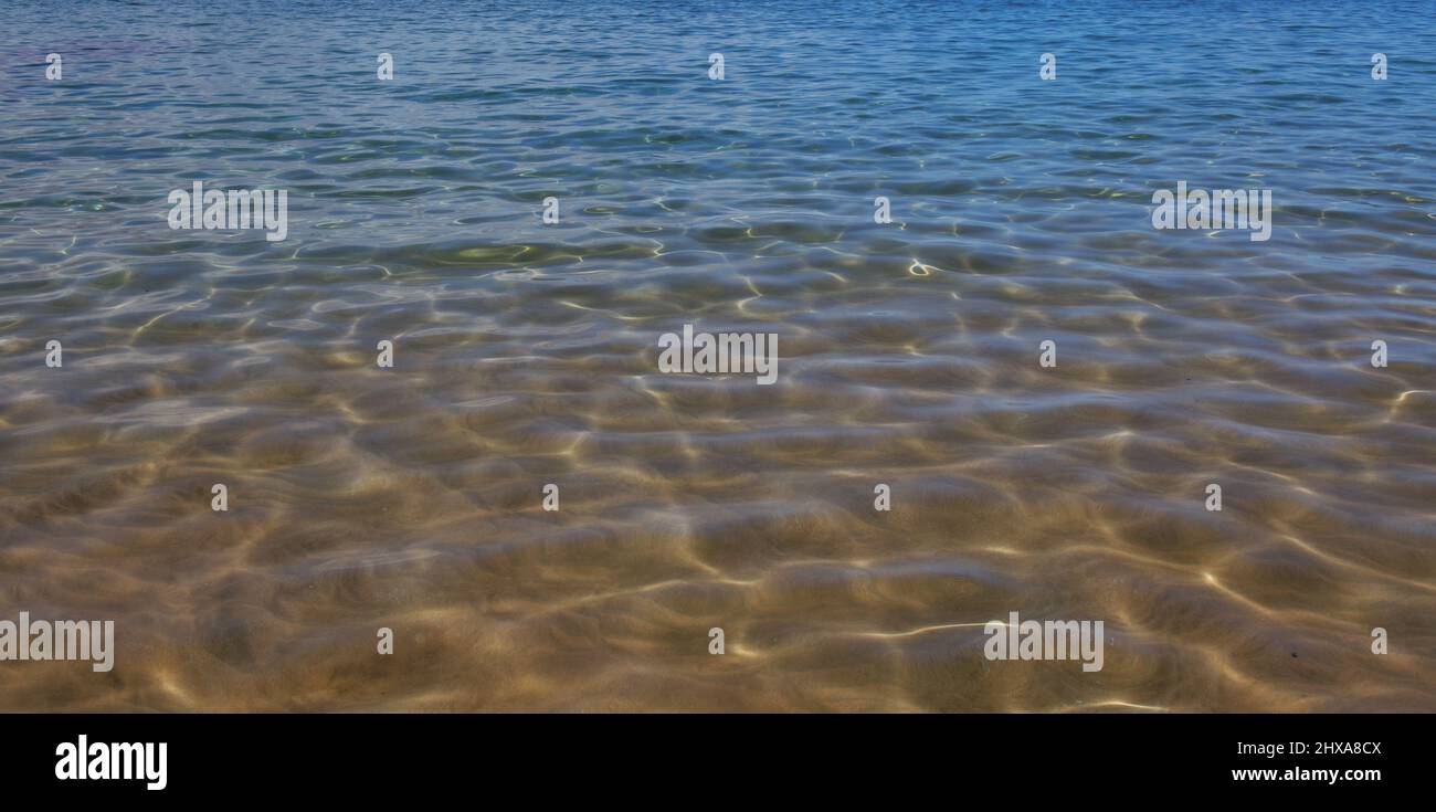 Calm sea water surface texture with splashes and waves. Abstract nature ...