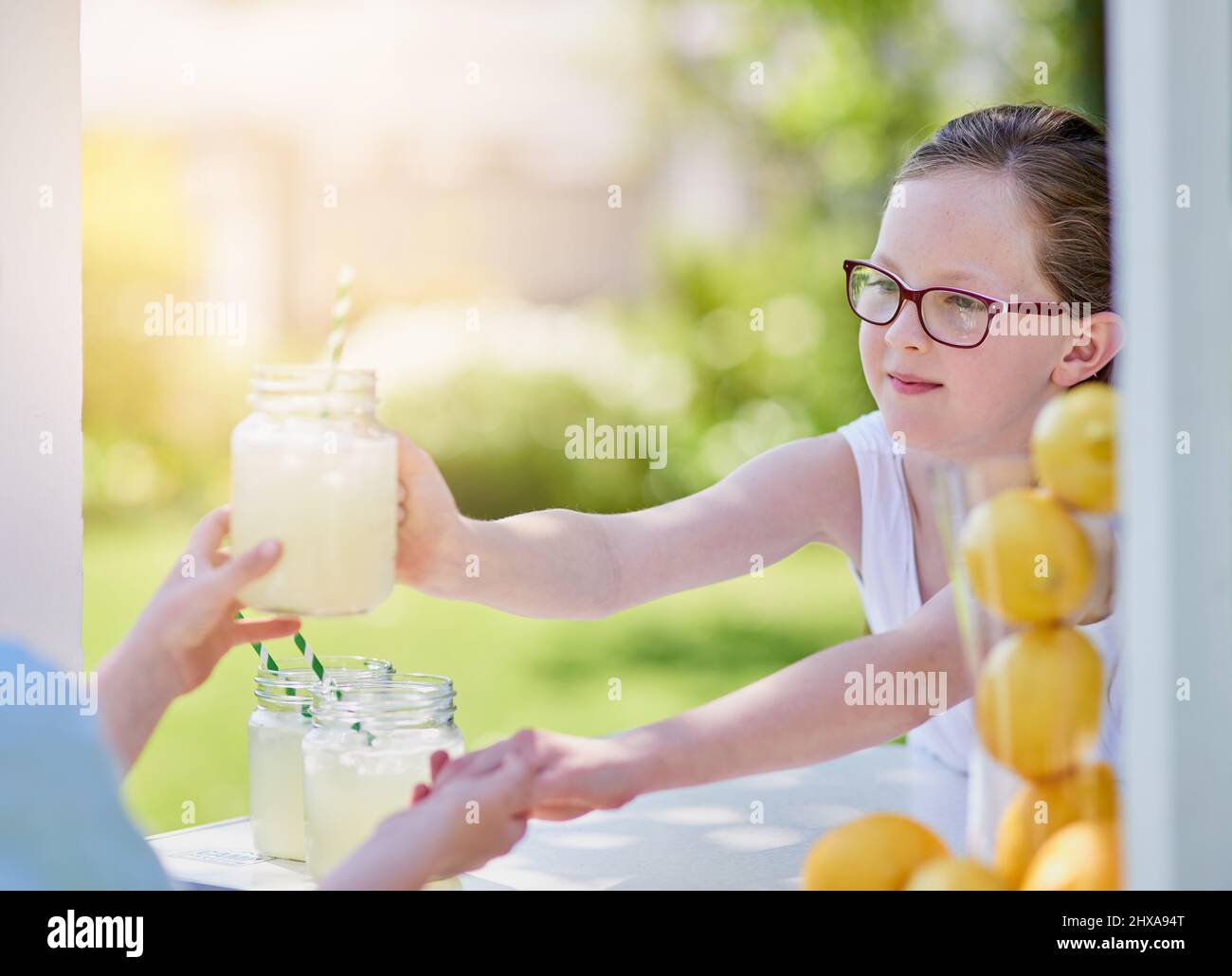 Here you go - enjoy. Cropped shot of a little girl selling lemonade ...