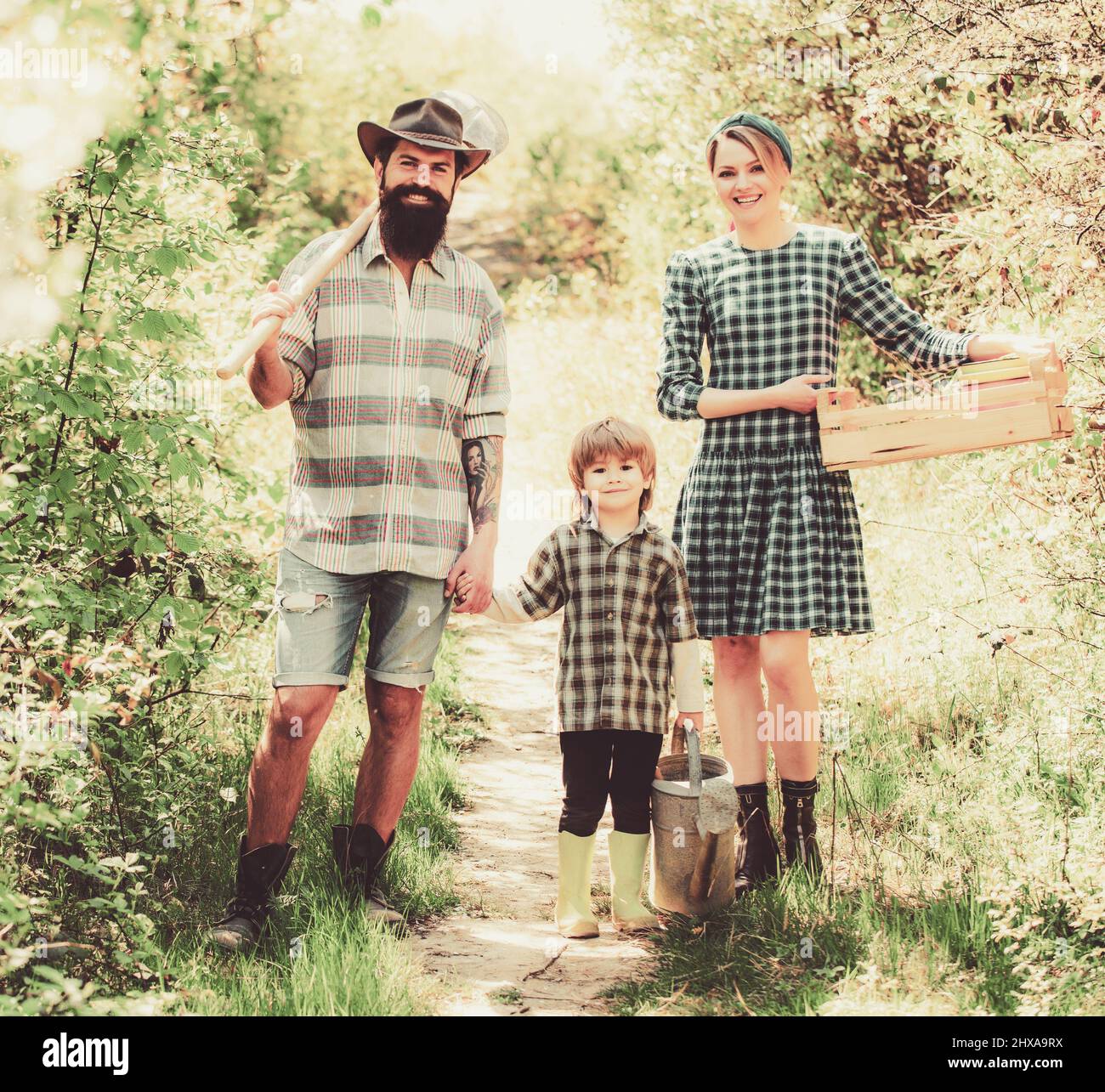 Family working together on farm. Family in the farm on countryside ...