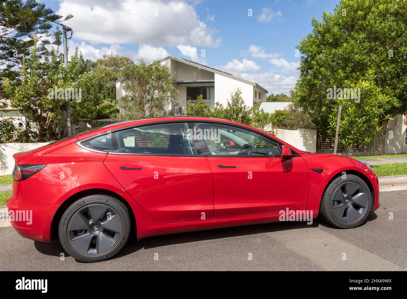 2022 red Tesla Model 3 car parked in a Sydney street, NSW,Australia ...