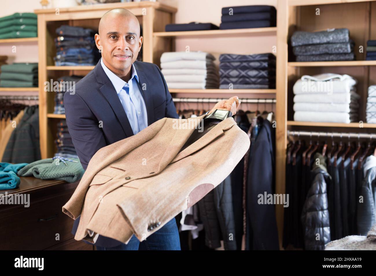 Male shop assistant suit jacket hi-res stock photography and images - Alamy