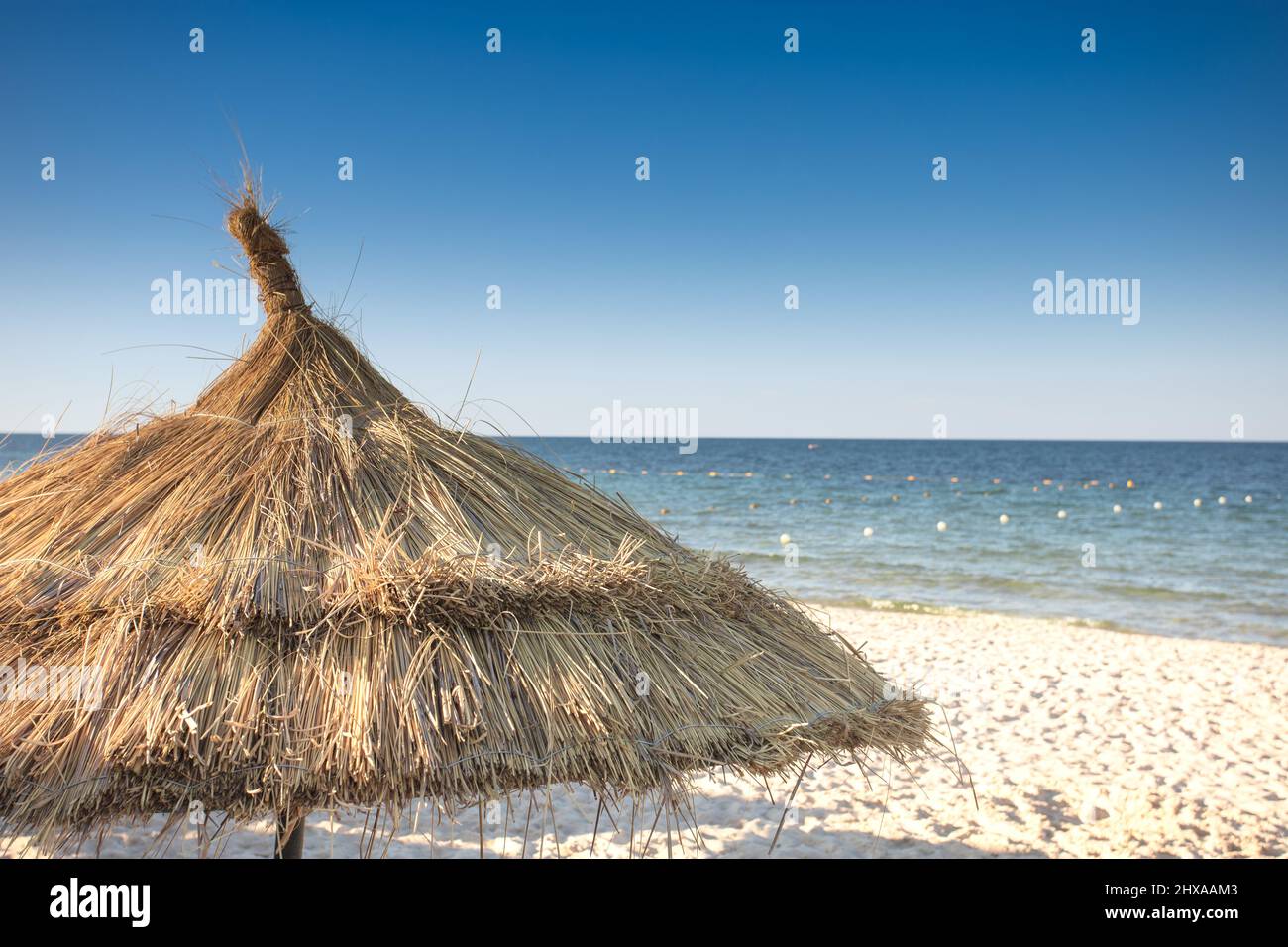 straw hut on a beach in Tunisia Stock Photo - Alamy