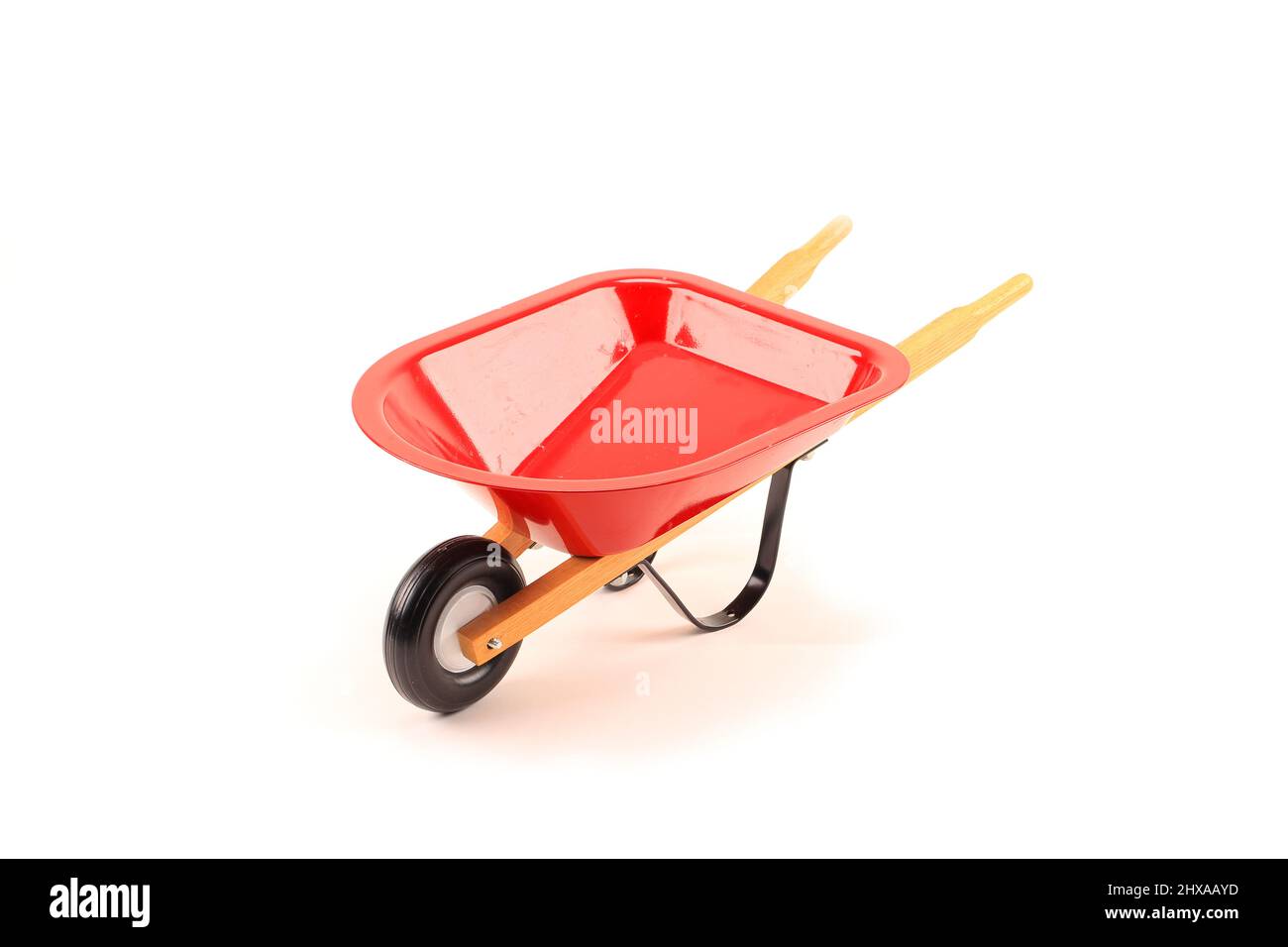 Wheelbarrow on white background Stock Photo - Alamy