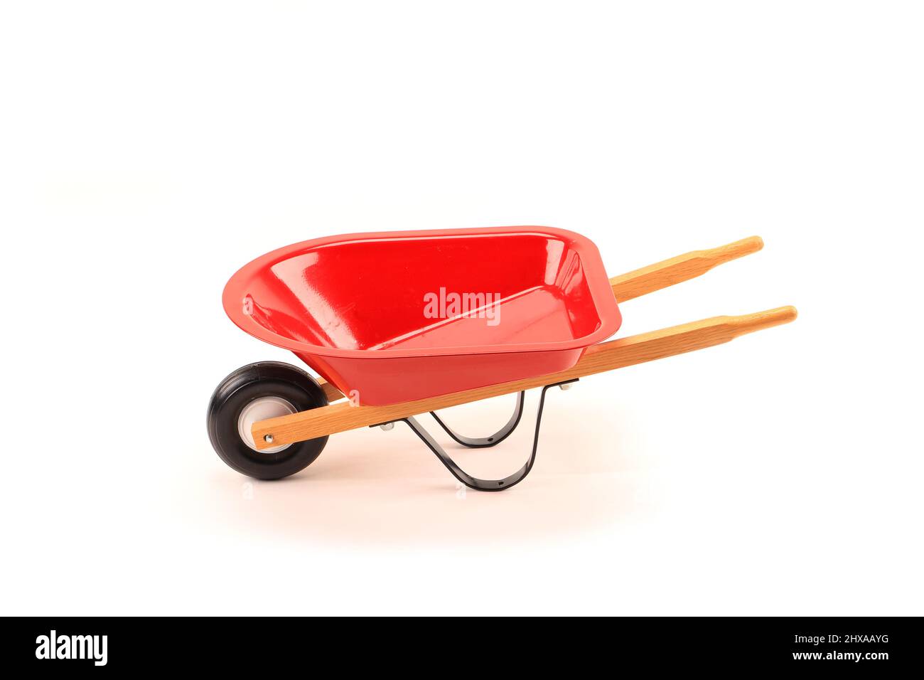Wheelbarrow on white background Stock Photo - Alamy