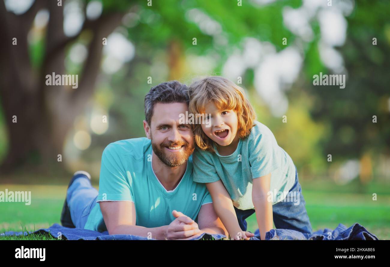 Childhood and parenthood kids concept. Happy father and son playing ...