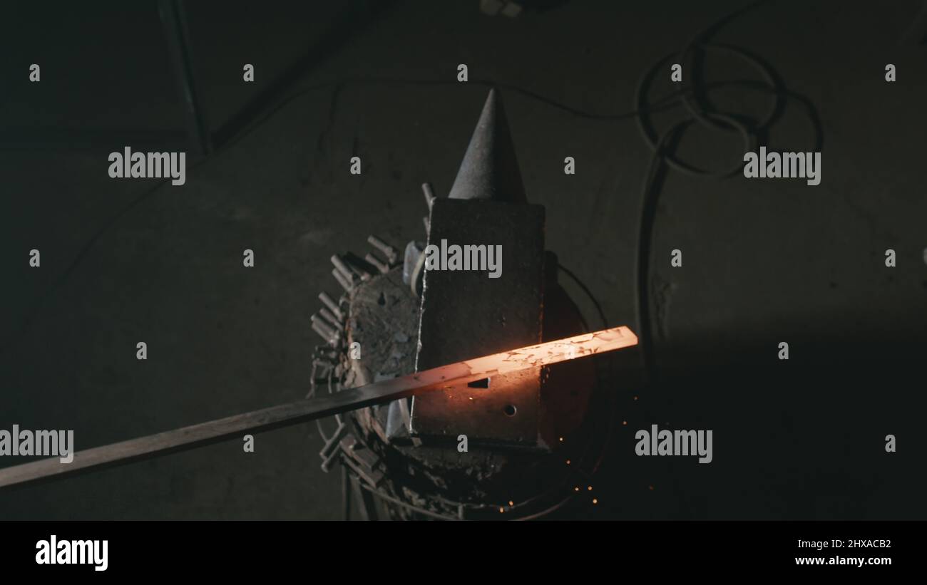 Forge workshop. Smithy manual production. Hands of smith with hammer ...