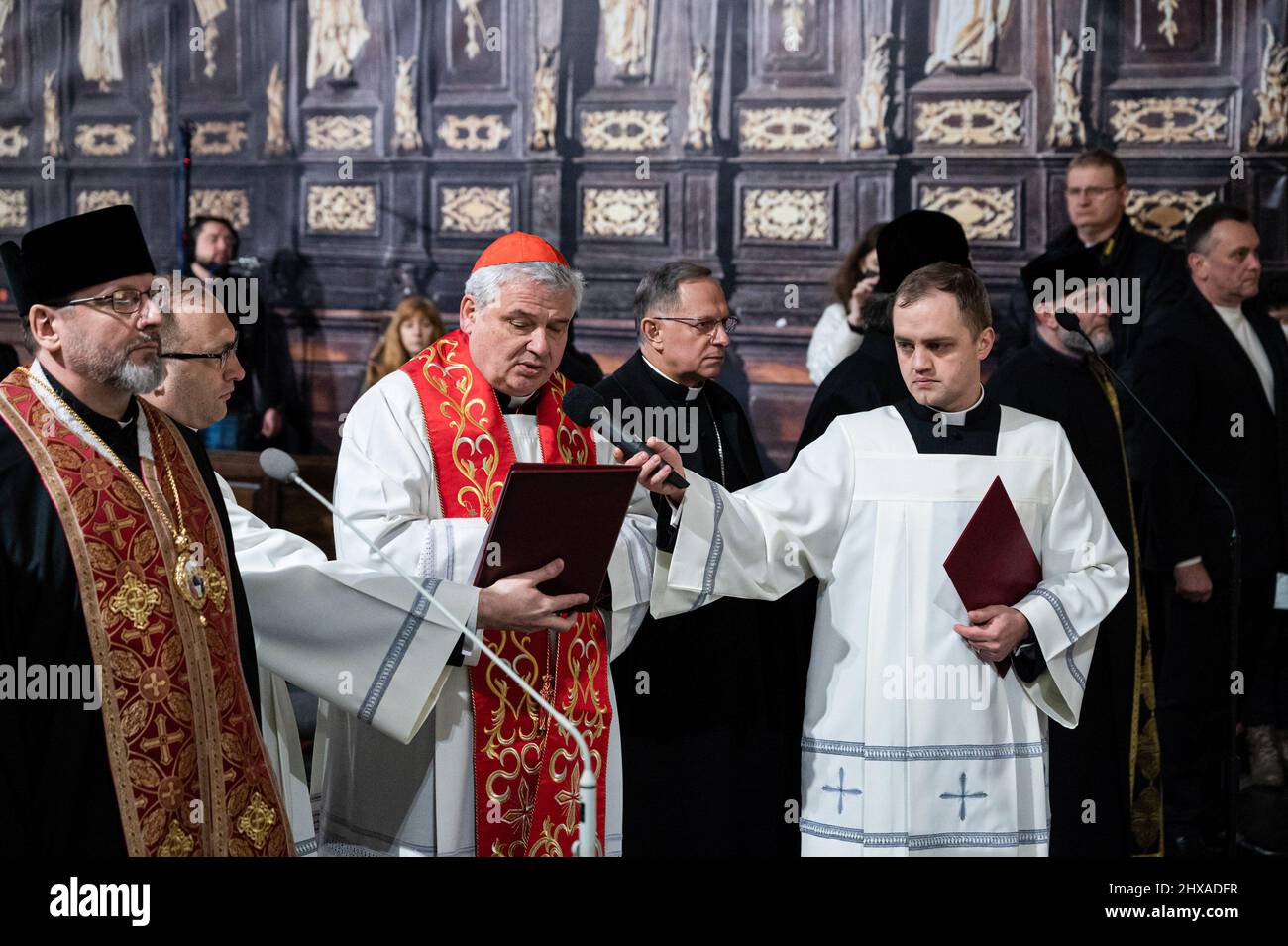 Lviv, Ukraine. 10th Mar, 2022. Cardinal Konrad Krajewski (L3) seen ...