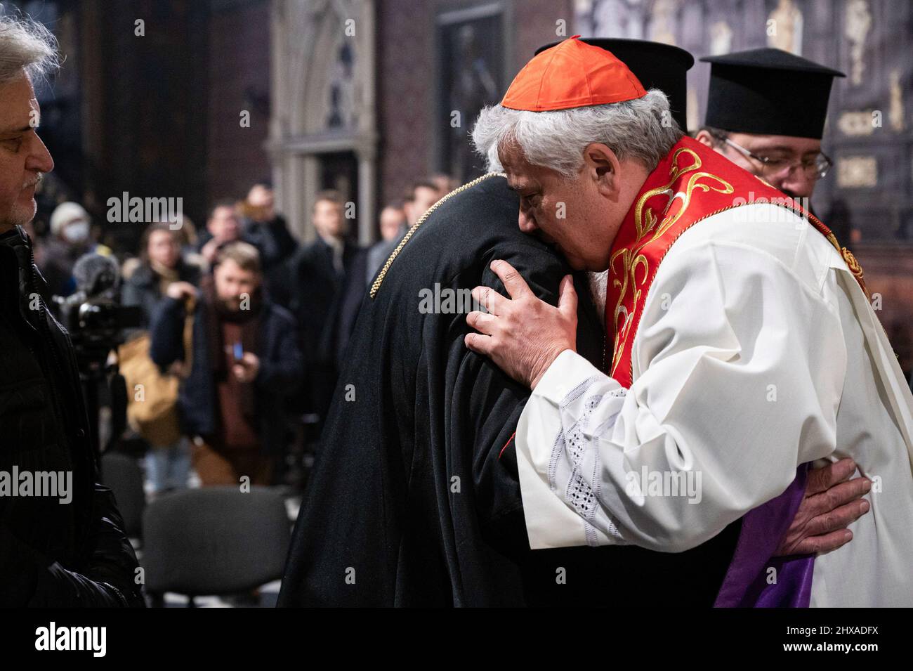 Lviv, Ukraine. 10th Mar, 2022. Cardinal Konrad Krajewsk (R) seen while ...