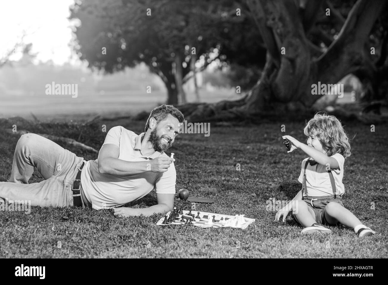 Chess board in park Black and White Stock Photos & Images - Alamy
