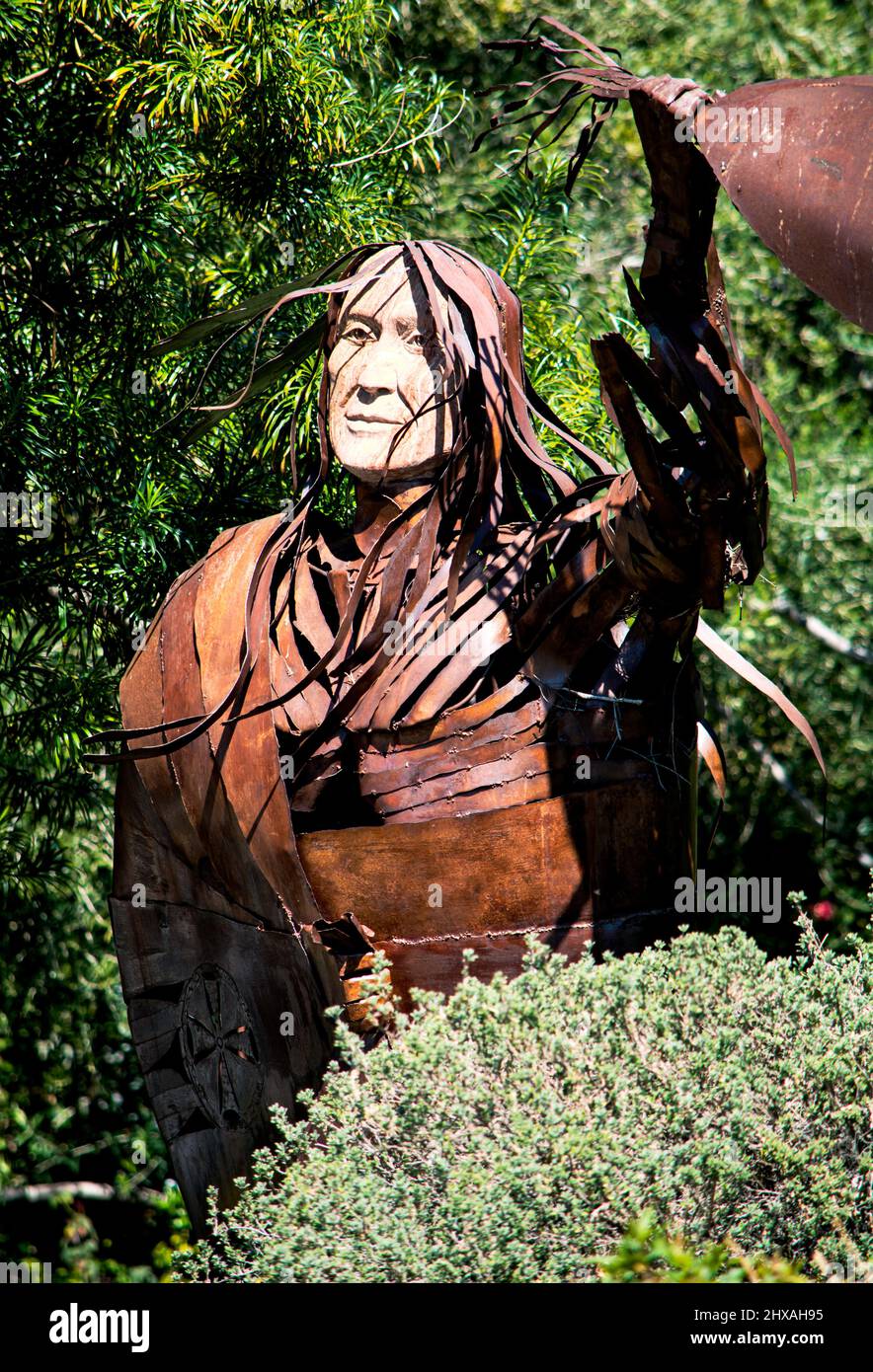 Native welcomes people into town Stock Photo - Alamy