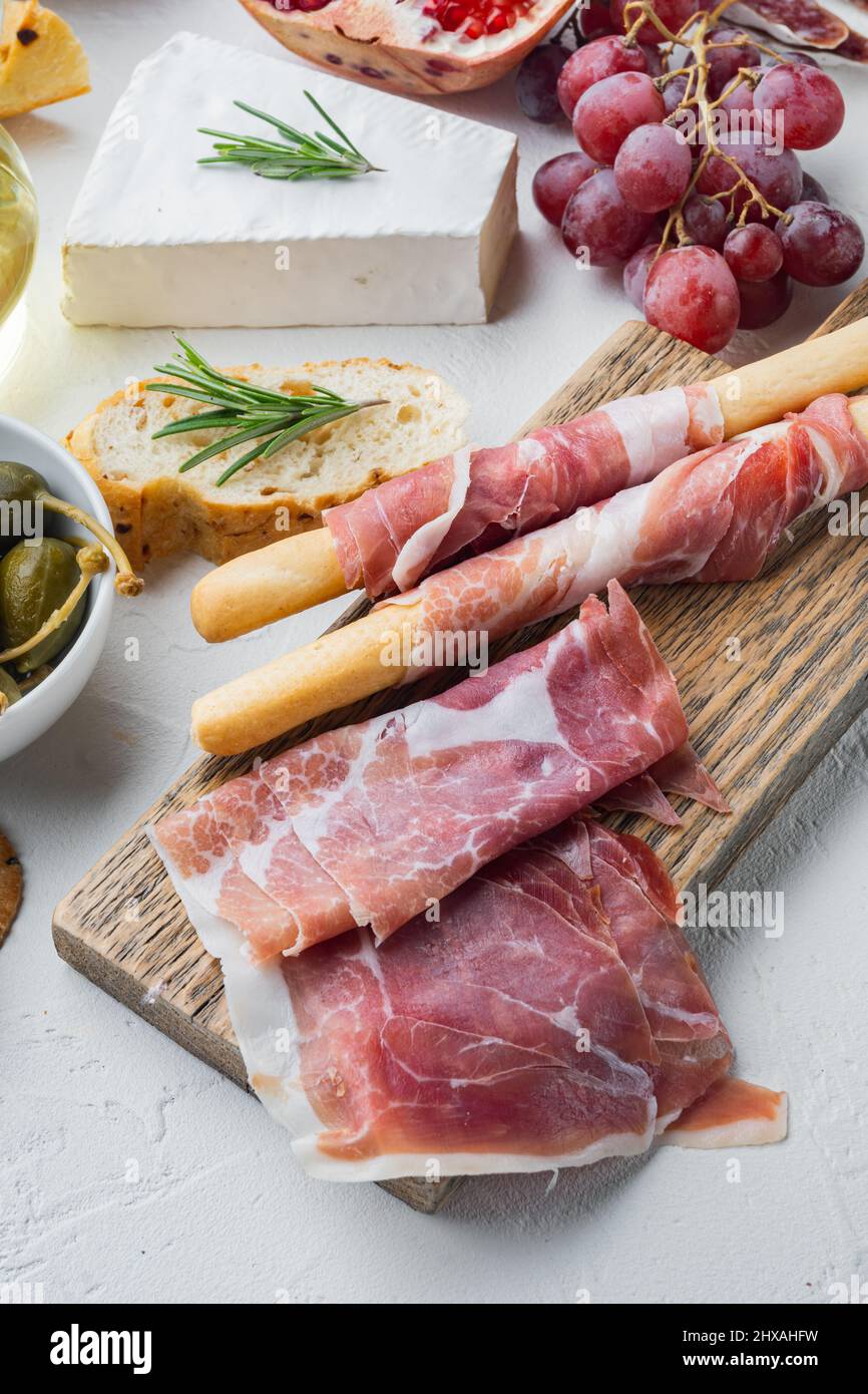 Pile of tasty hamon set, on white background Stock Photo - Alamy