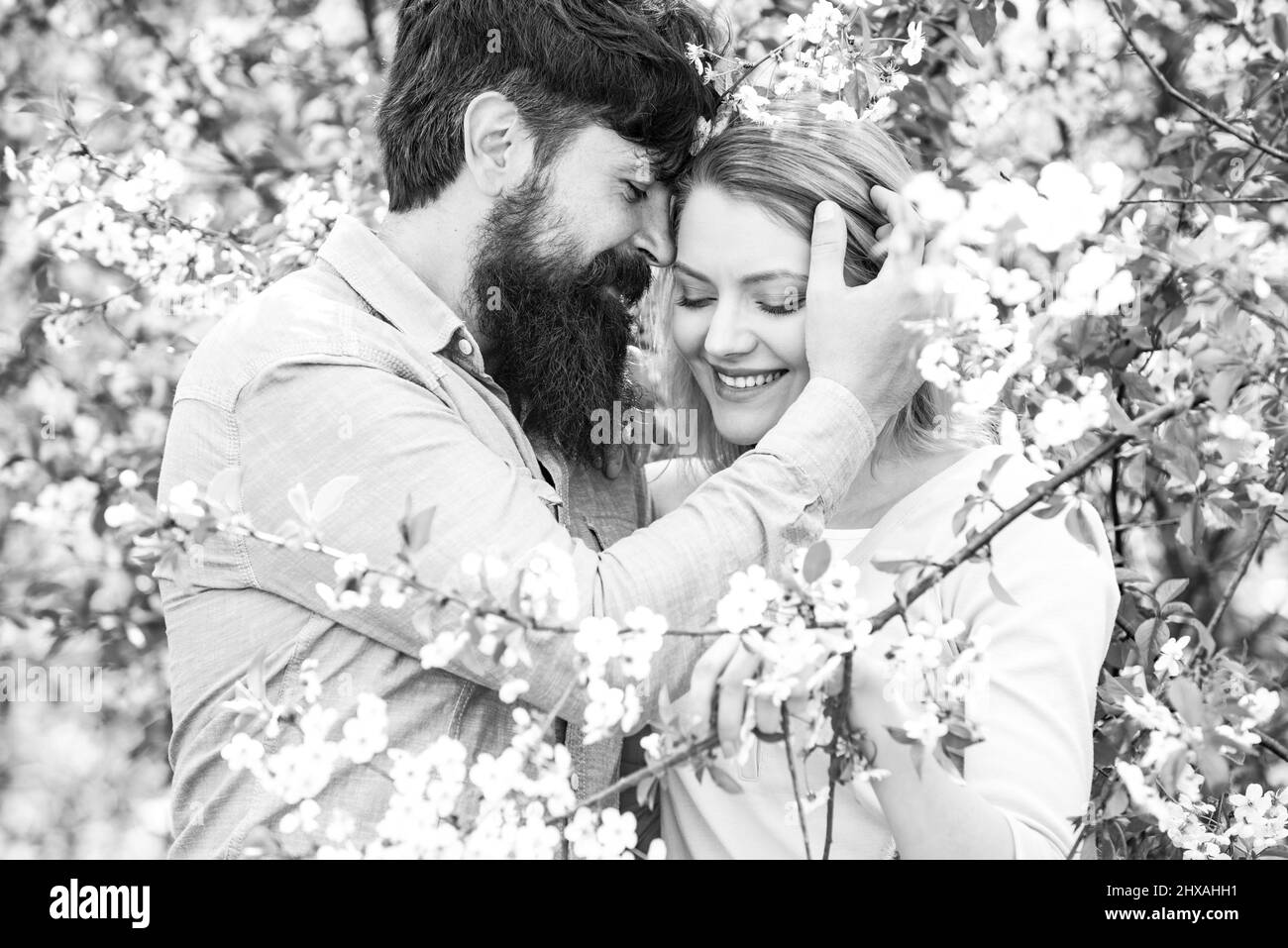 Easter couple, Spring couple laughing and hugging. Young happy couple ...