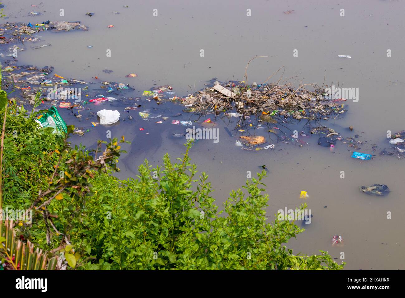 river pollution image. save river water form pollution Stock Photo - Alamy