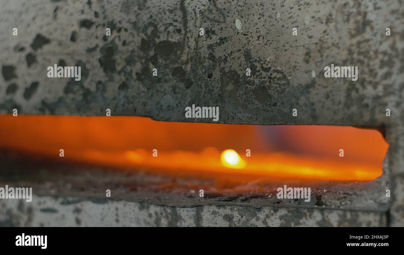 Forge workshop. Smithy manual production. Gas furnace for heating metal ...