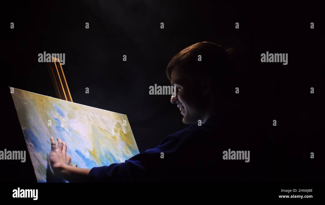 Artist copyist paint seascape with ship in ocean. Vaper smoke vape e ...