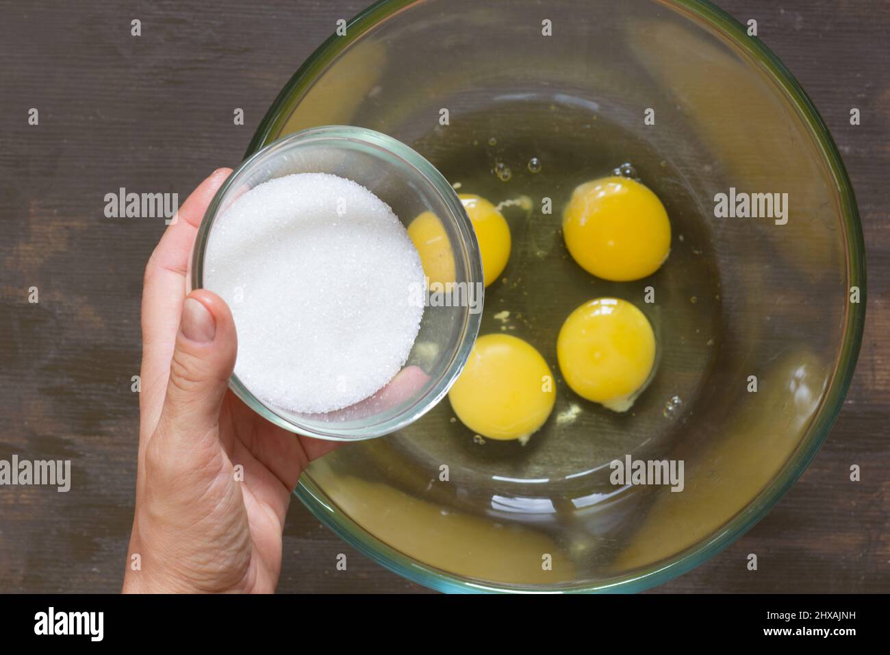 Woman putting fresh raw hi-res stock photography and images - Alamy