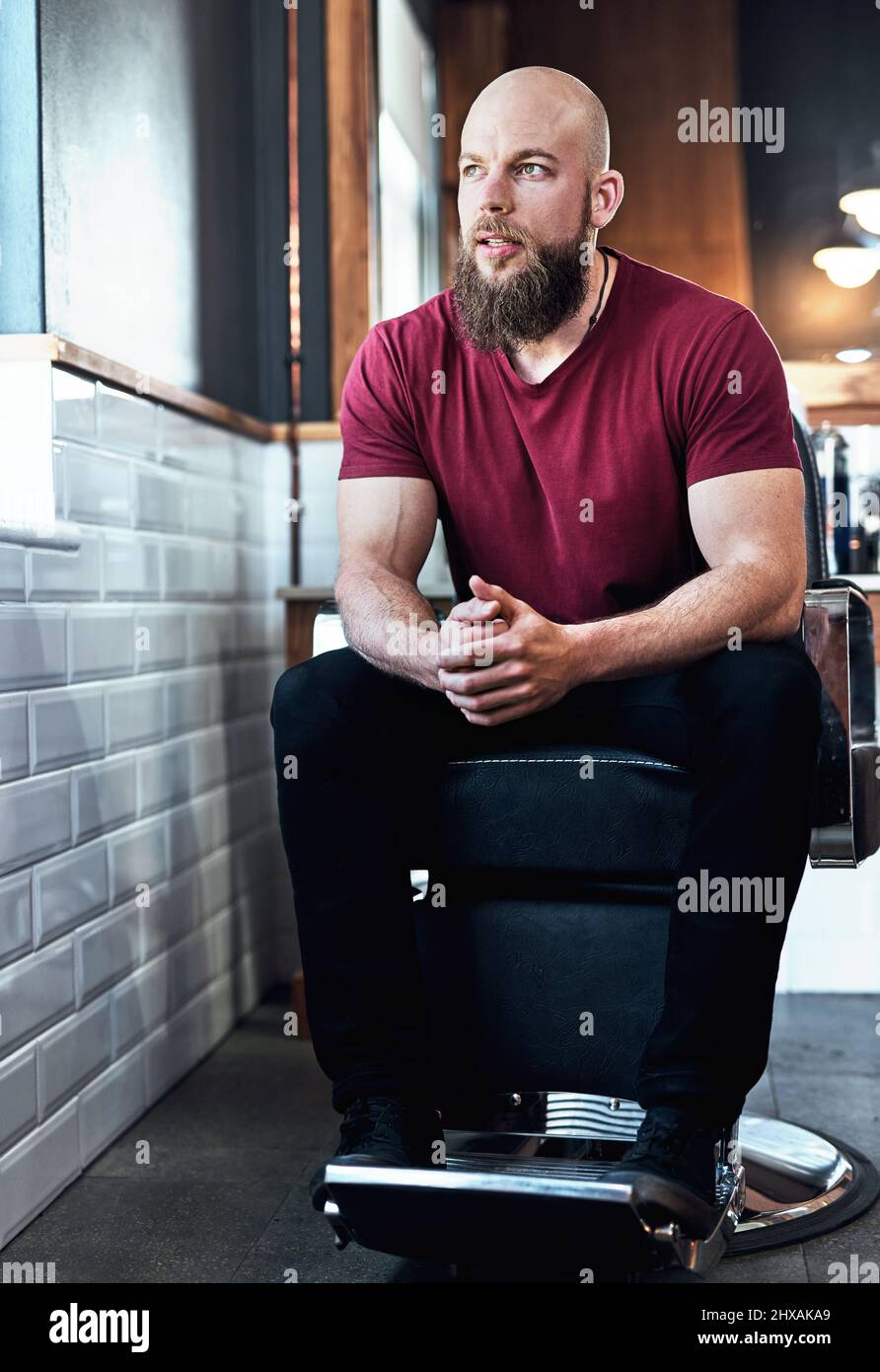 Its always more than just a haircut. Full length shot of a handsome ...