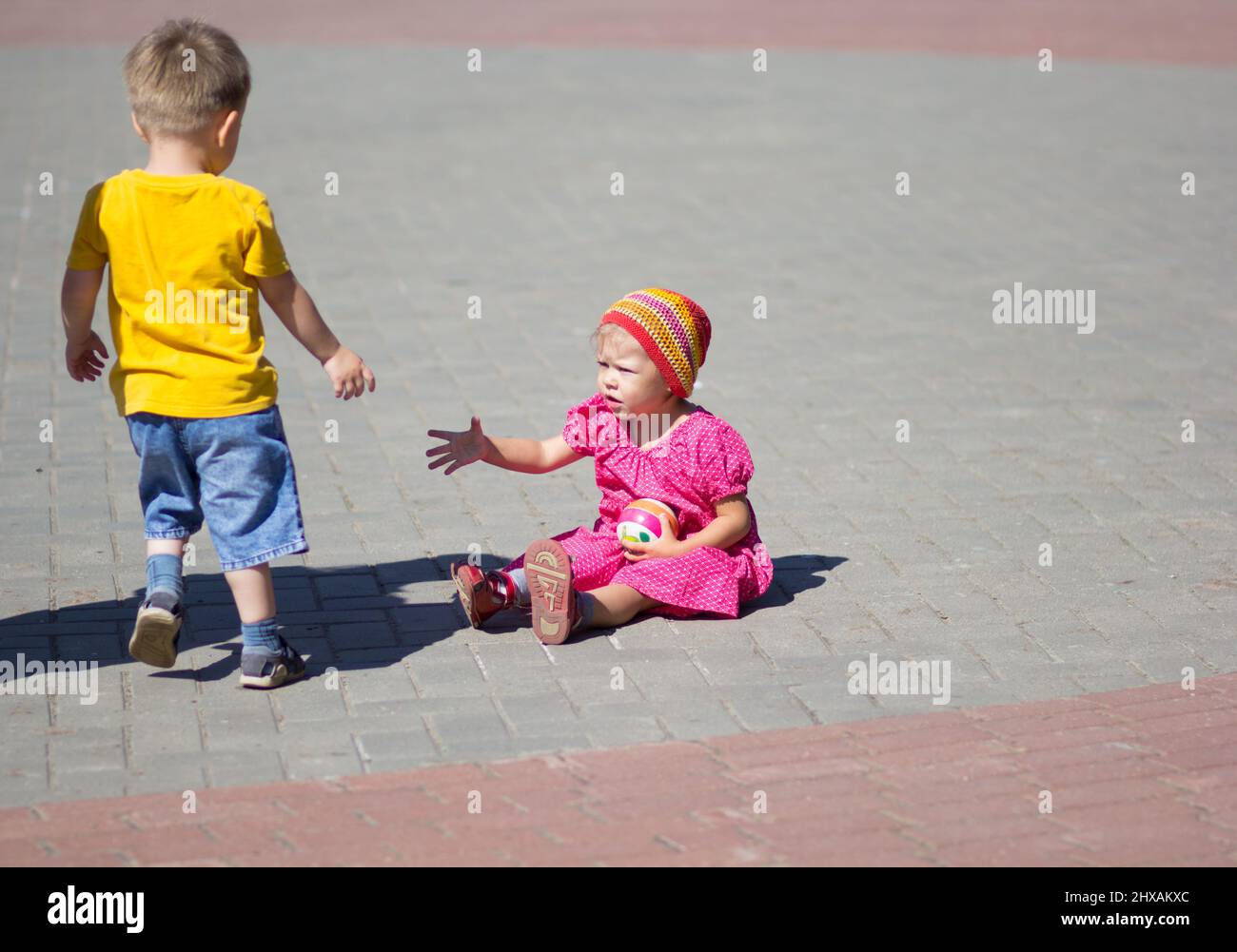Kids helping their friend up hi-res stock photography and images - Alamy