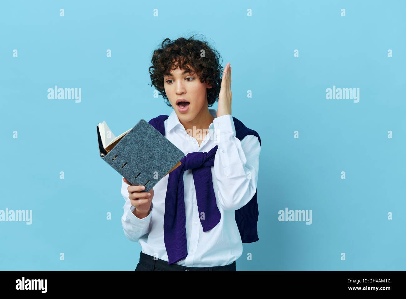 student with a notepad in a sweater shirt on the shoulders isolated ...