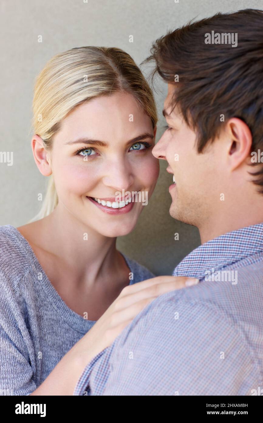 In love with life. Portrait of an affectionate young couple standing ...