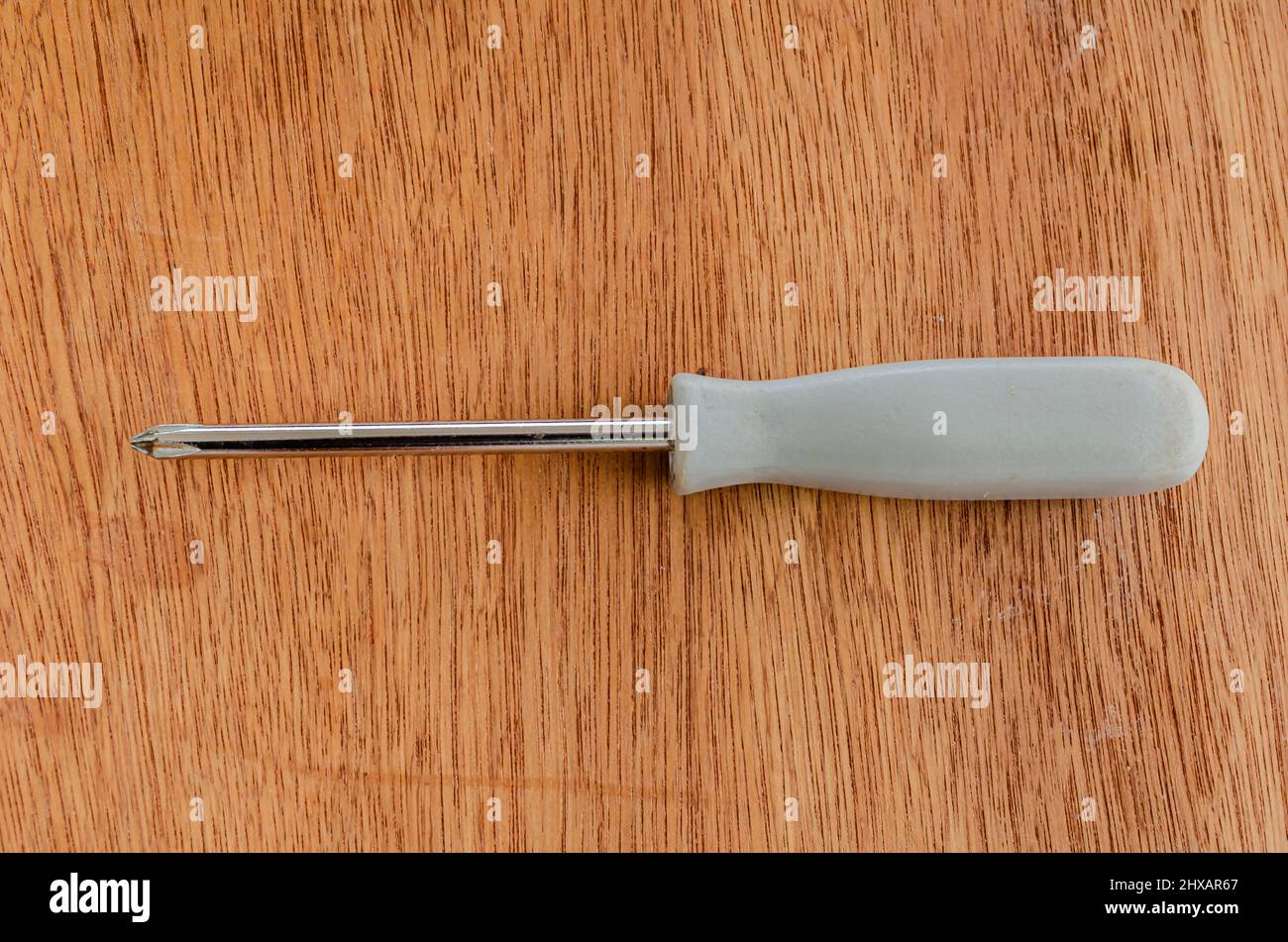 Phillips Screwdriver On Board Stock Photo - Alamy