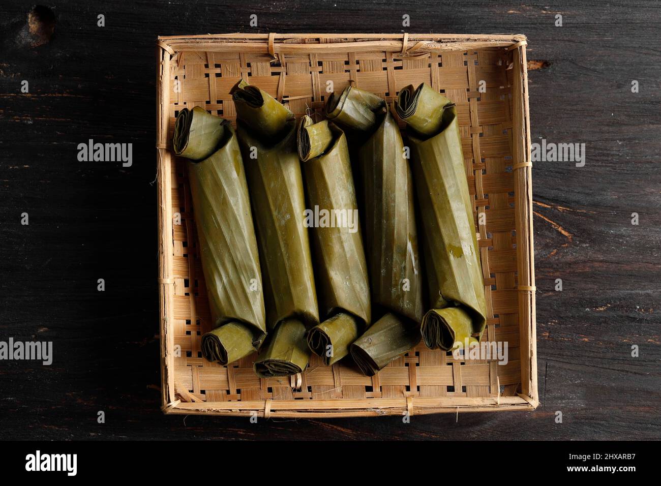 arem-arem is traditional food from java. is rice cake filled with spicy ...