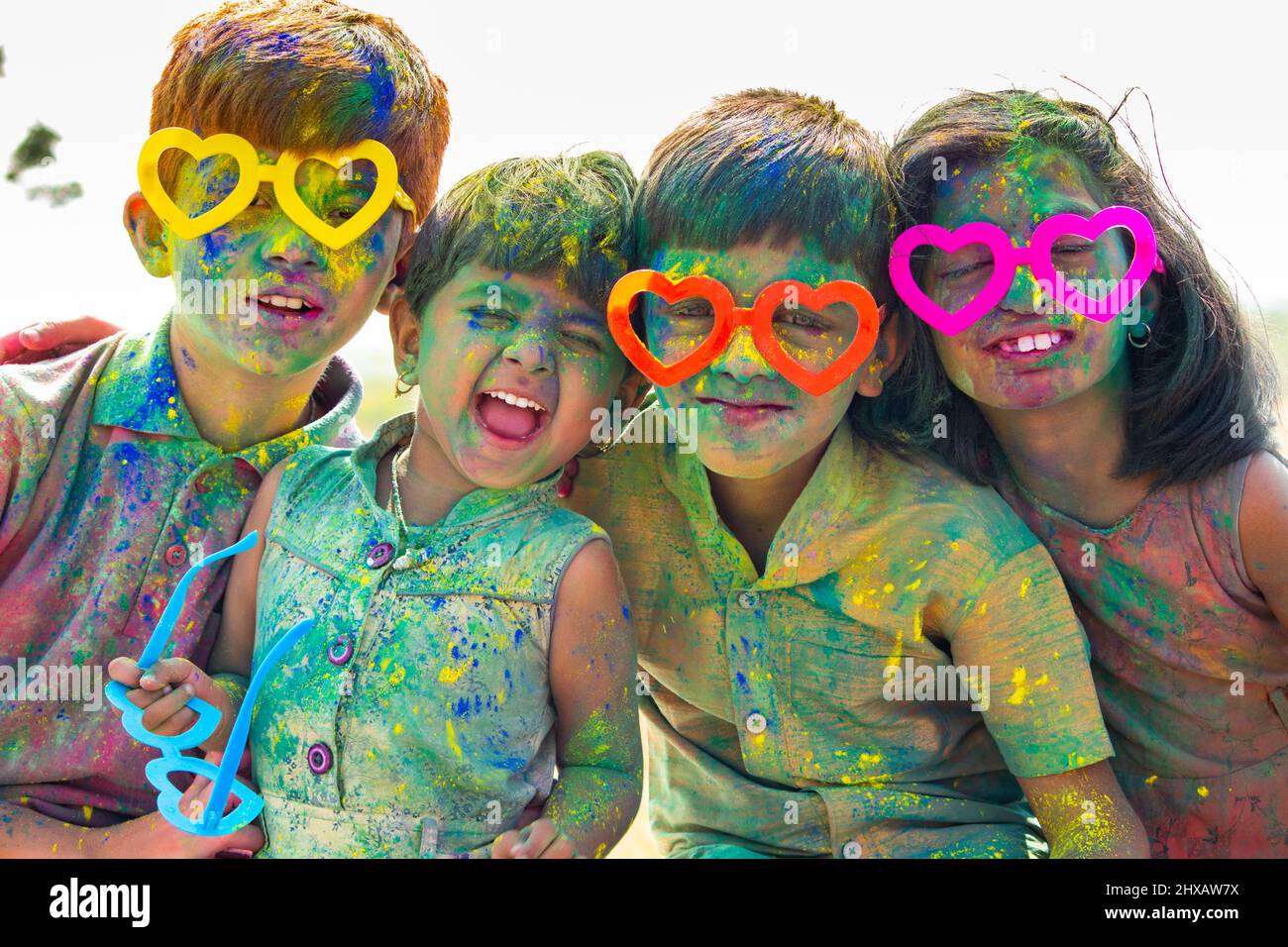 Group of Cheerful kids with fun spectacles Shouting at camera after ...