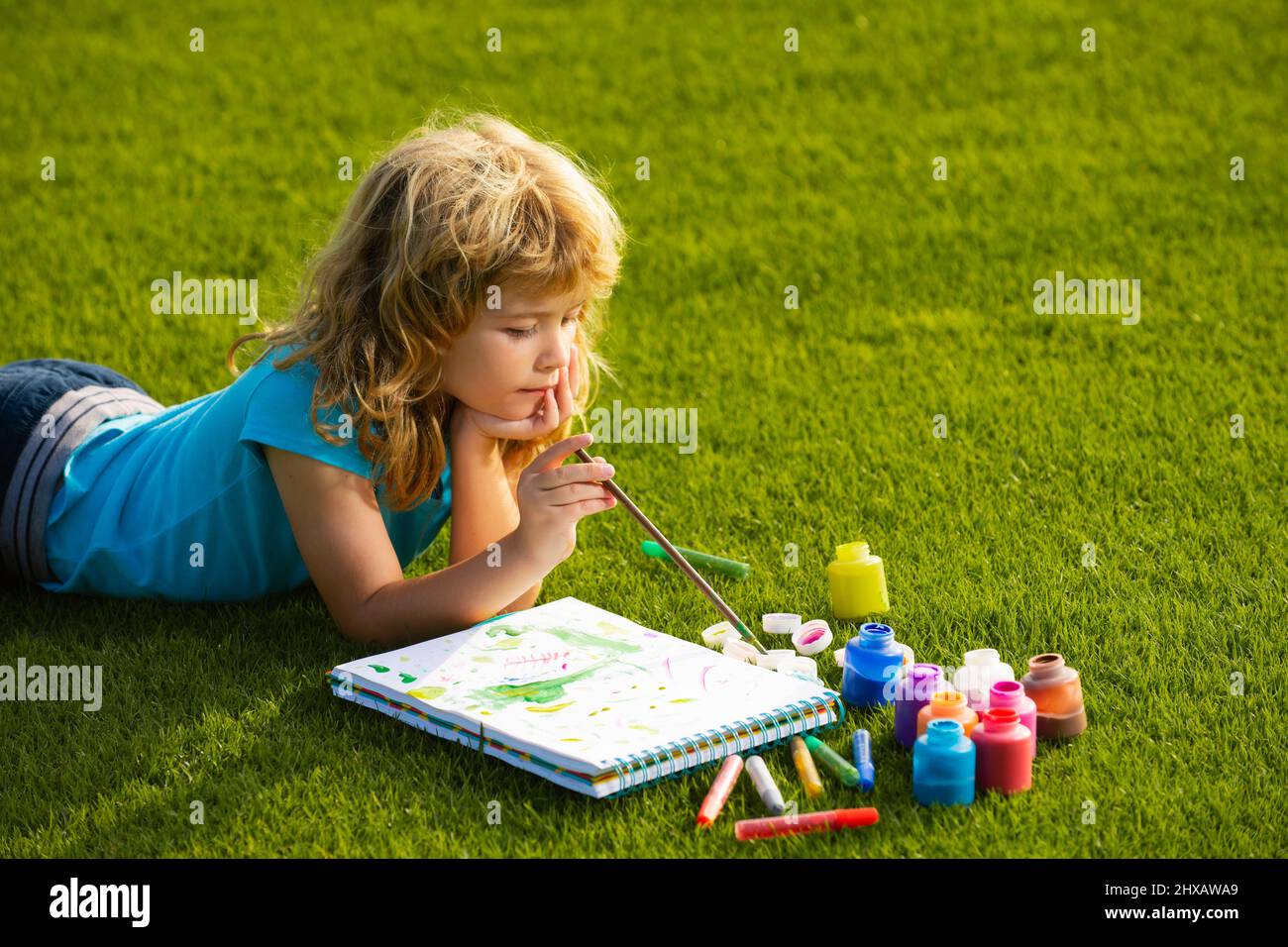 Artist kids. Schooler kids drawing in summer park, painting art. Little ...