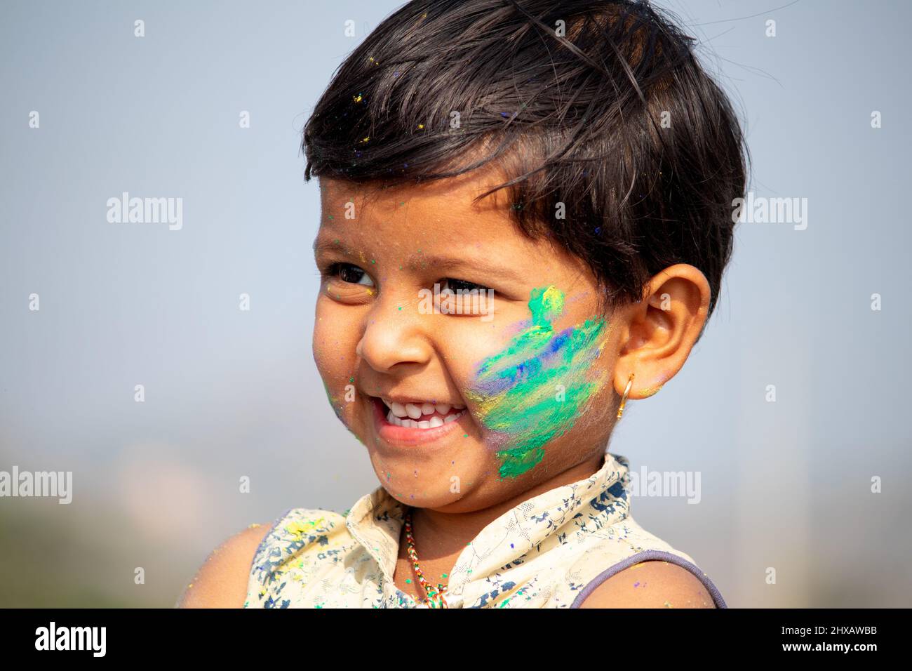 Child playing holi festival hi-res stock photography and images - Alamy