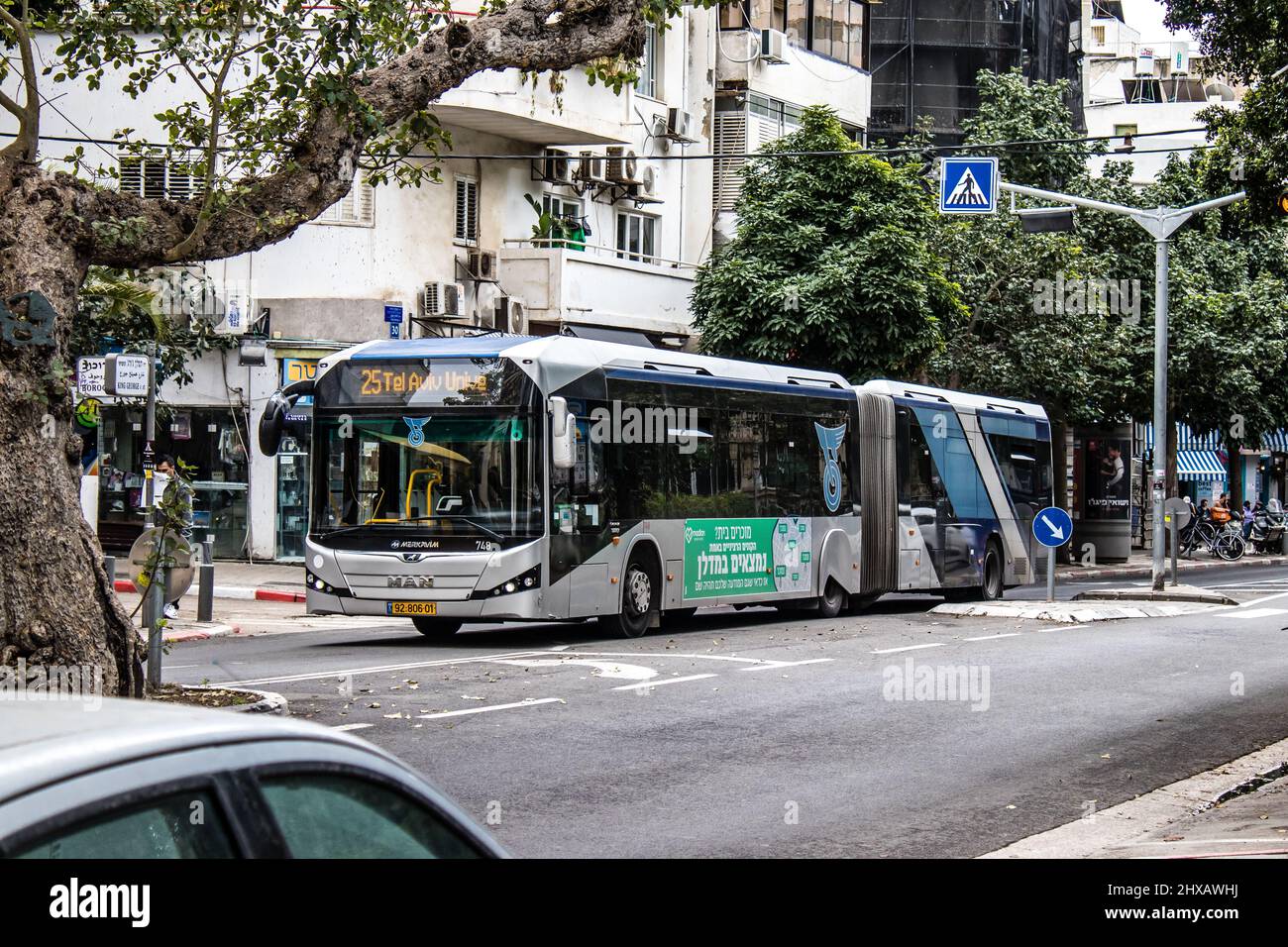 Tel Aviv, Israel - March 09, 2022 Israeli public bus driving through ...