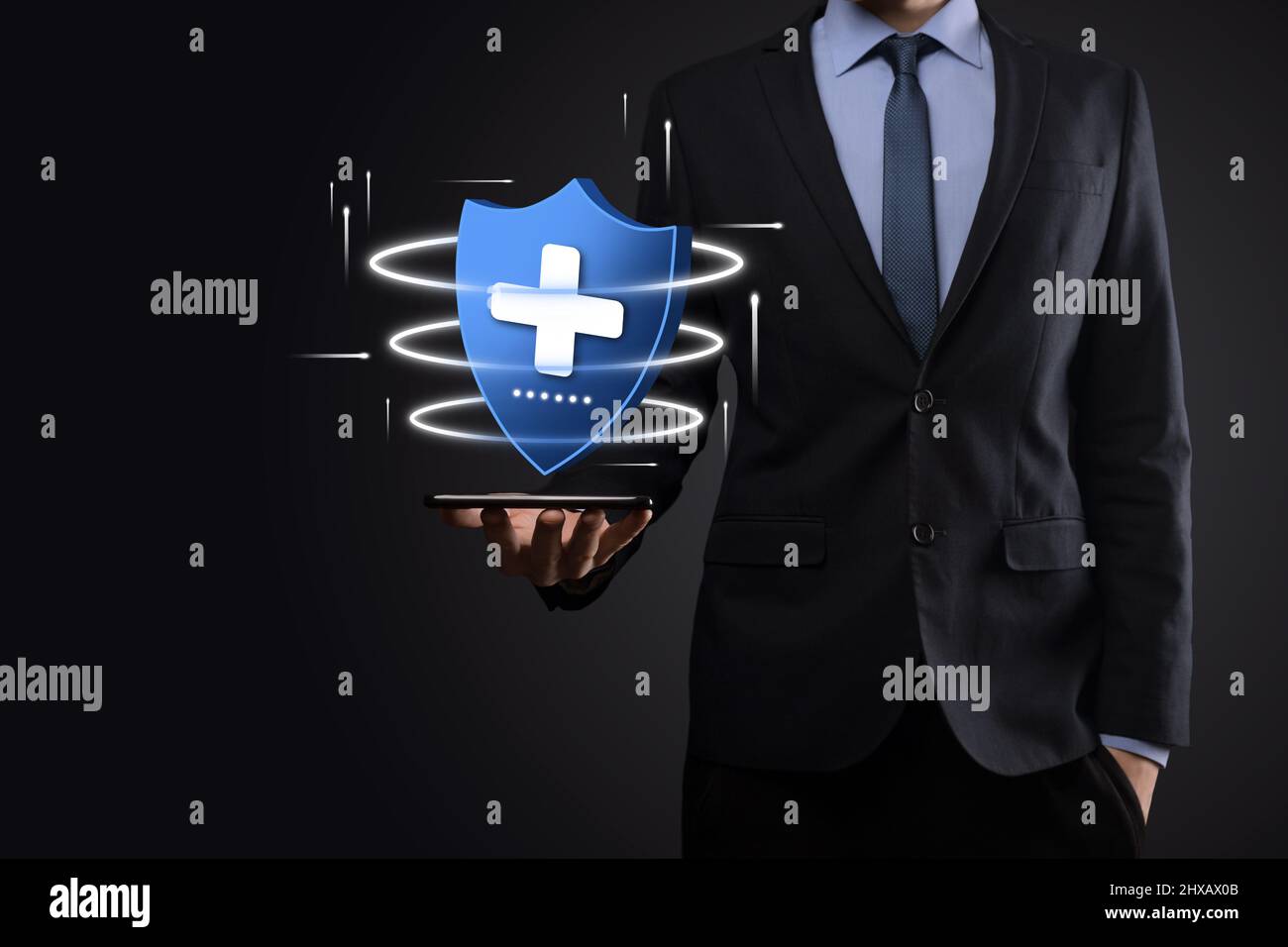 Businessman hold Shield with plus Low polygonal icon, medicine icon ...