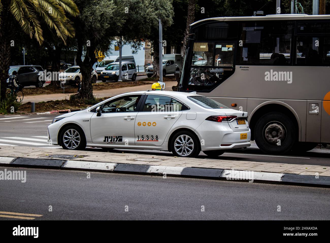Tel Aviv, Israel - March 09, 2022 Taxi driving in the streets of Tel ...