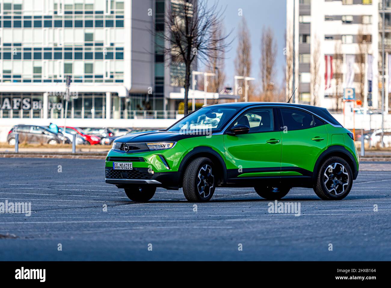 Riga, Latvia - 26 March, 2021: green electric vehicle Opel Mokka-e in ...