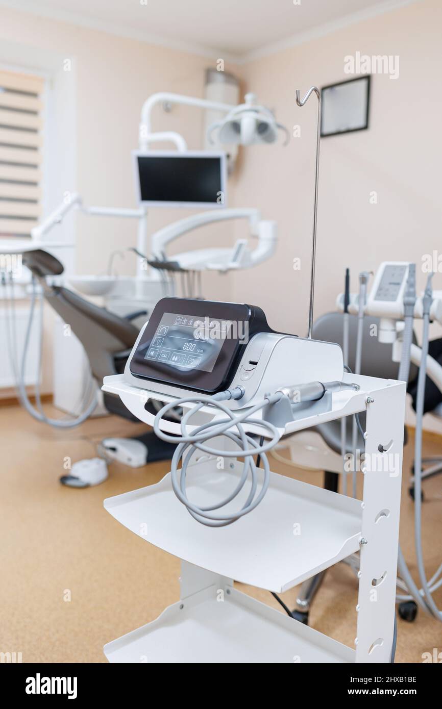 Modern dental clinic, dental chair and other accessories used by ...
