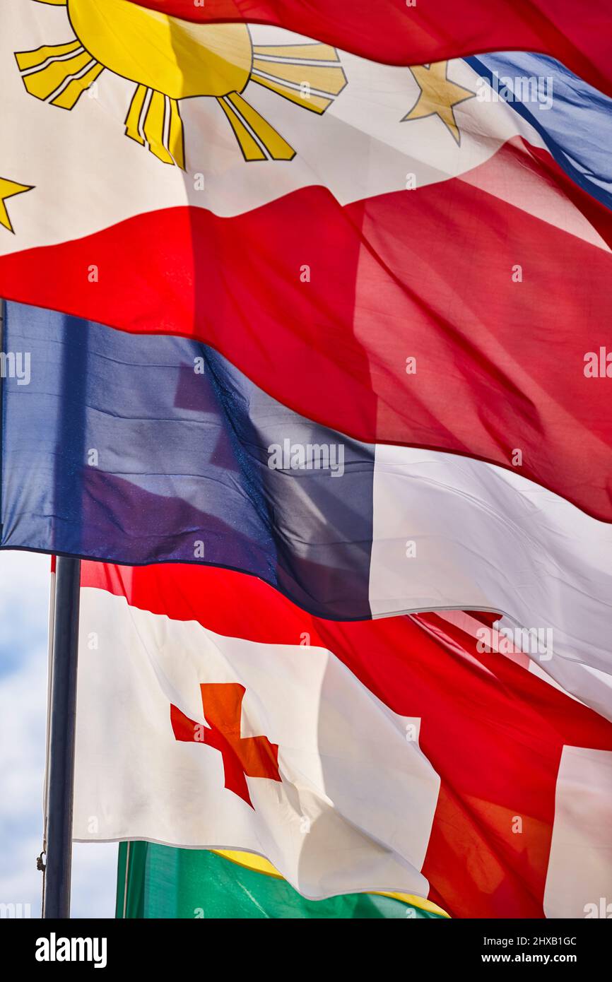 Flags of the word waving in the wind. Nation emblems Stock Photo - Alamy