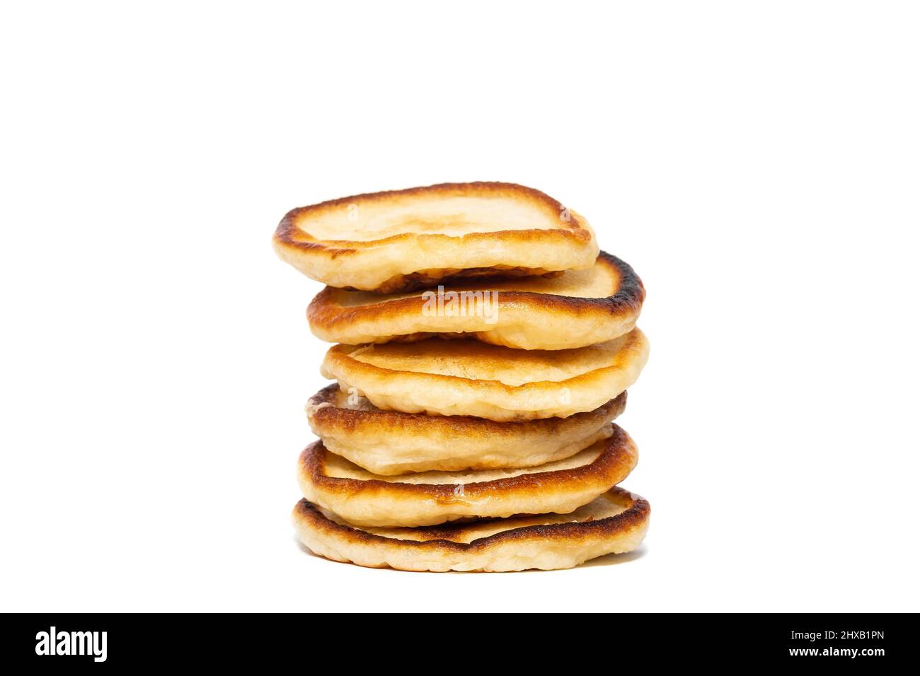 A stack of plain pancakes on a white background Stock Photo - Alamy