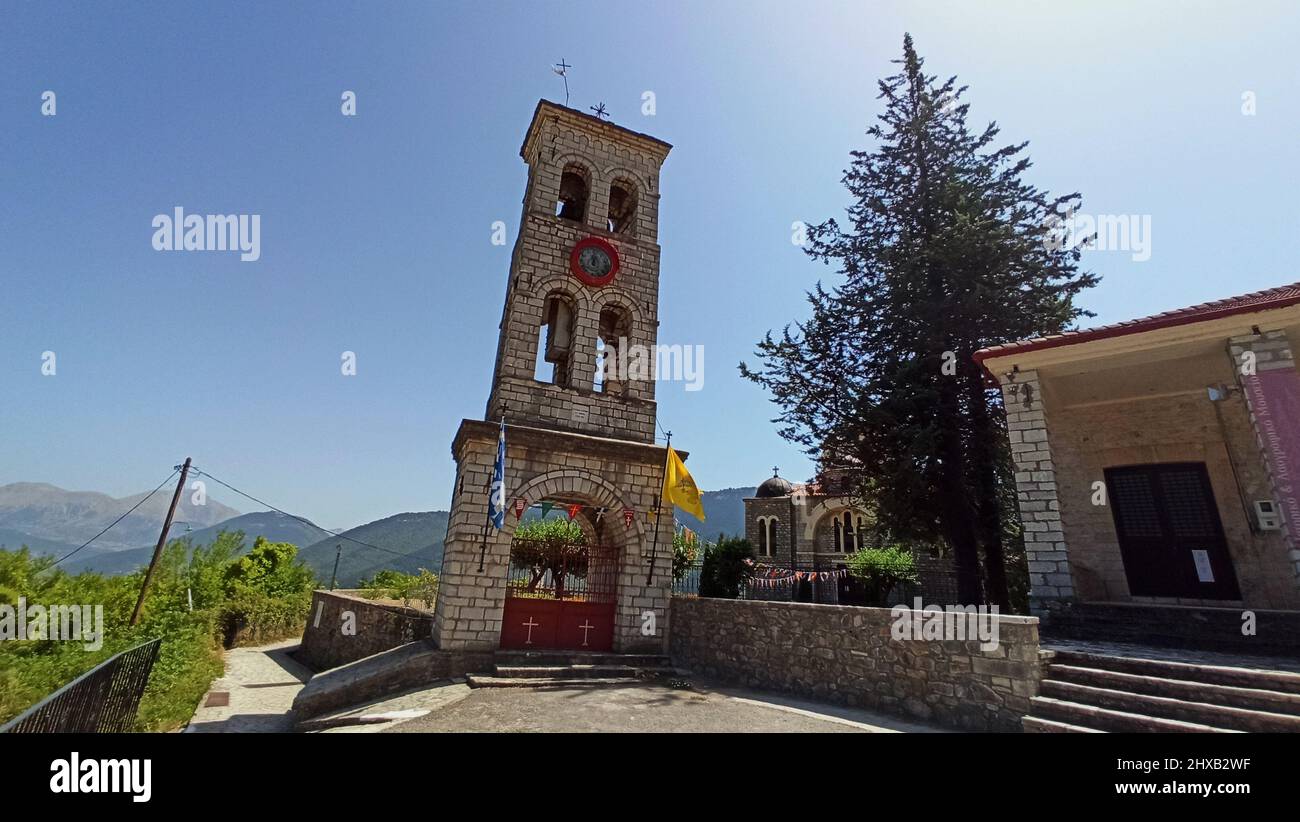The bell tower in Mikro Chorio village at Karpenisi Greece Stock Photo ...