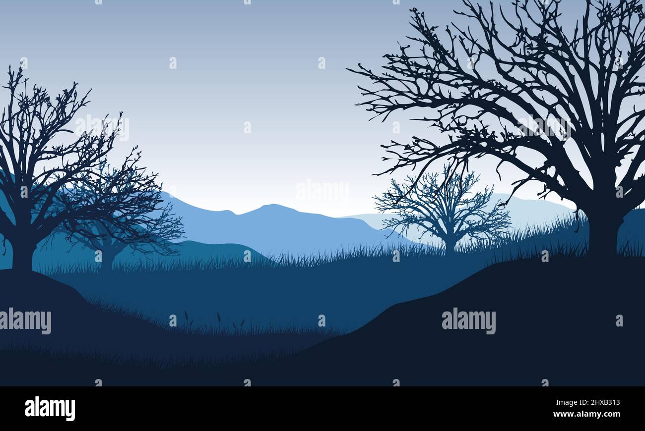 Great mountain view from the edge of town at sunrise with silhouettes ...