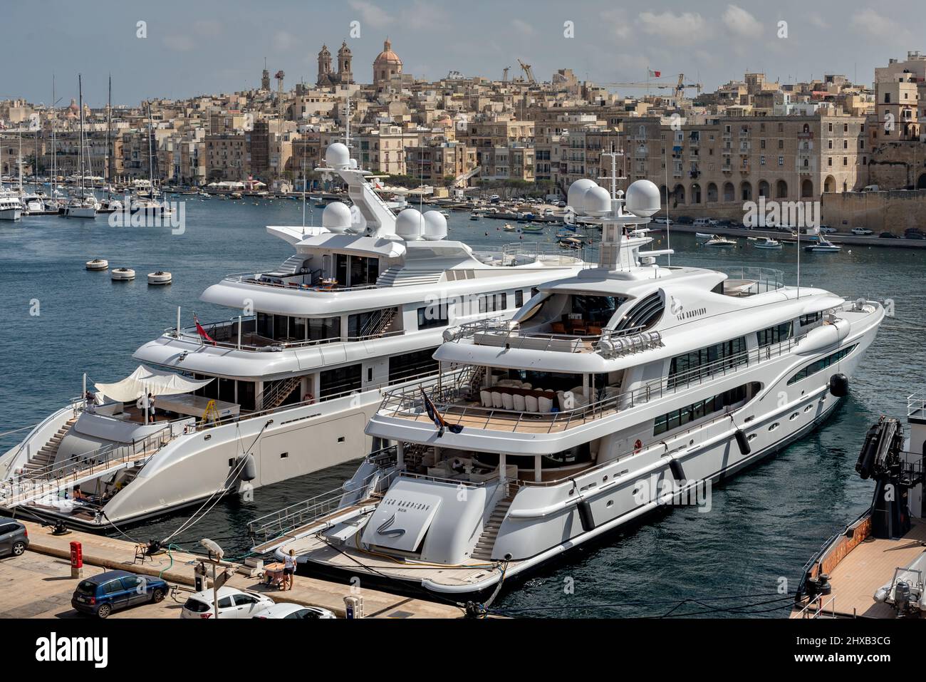The 212 ft luxury super yacht Sea Rhapsody, and 240 ft Plan B, berthed ...