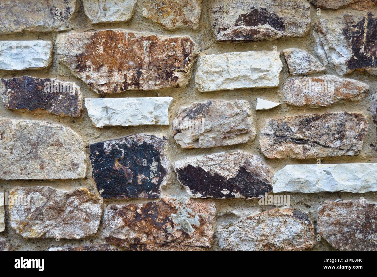 Sturdy brown and beige cut stone wall, good for backgrounds, seamless ...