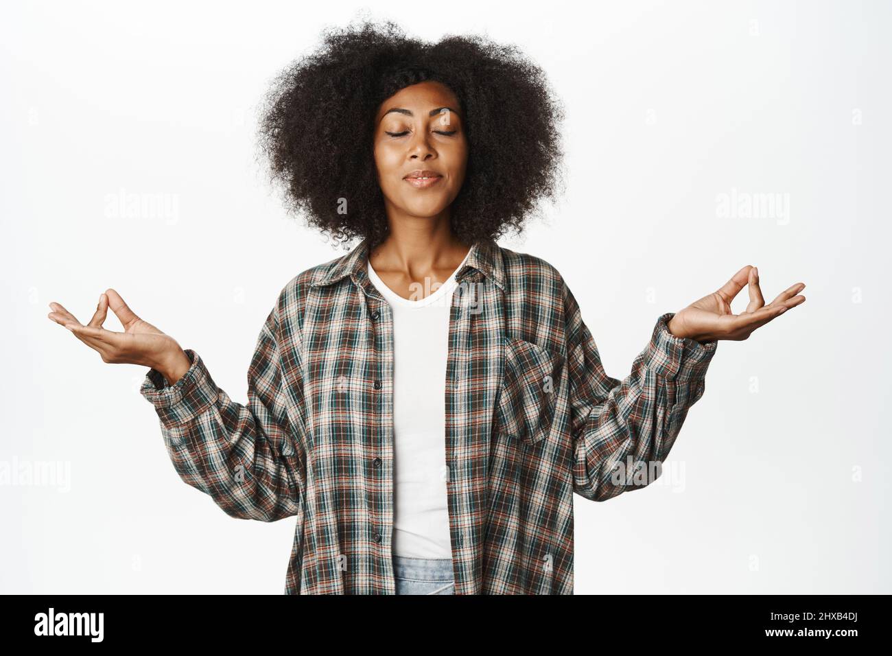 Peace and mindfulness. Young african woman, black female model ...