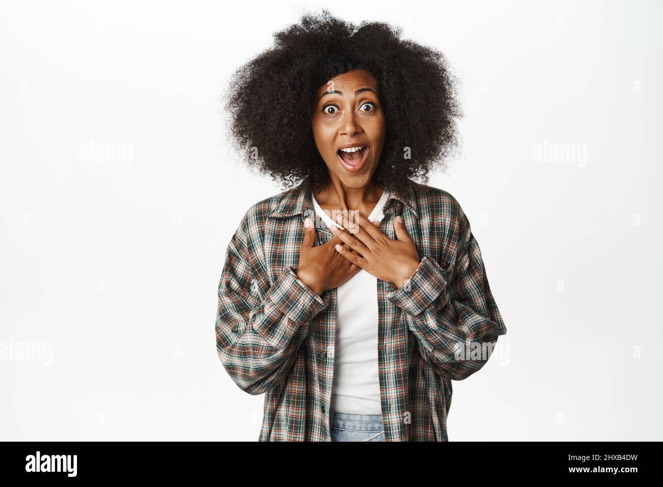 Portrait of surprised and amazed Black woman, gasping fascinated ...