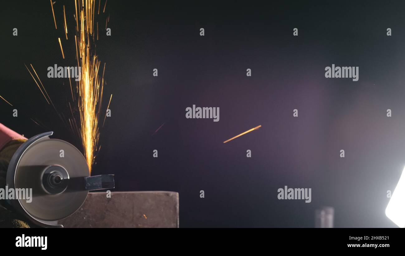 Forge workshop. Smithy manual production. Close up details of sparks ...