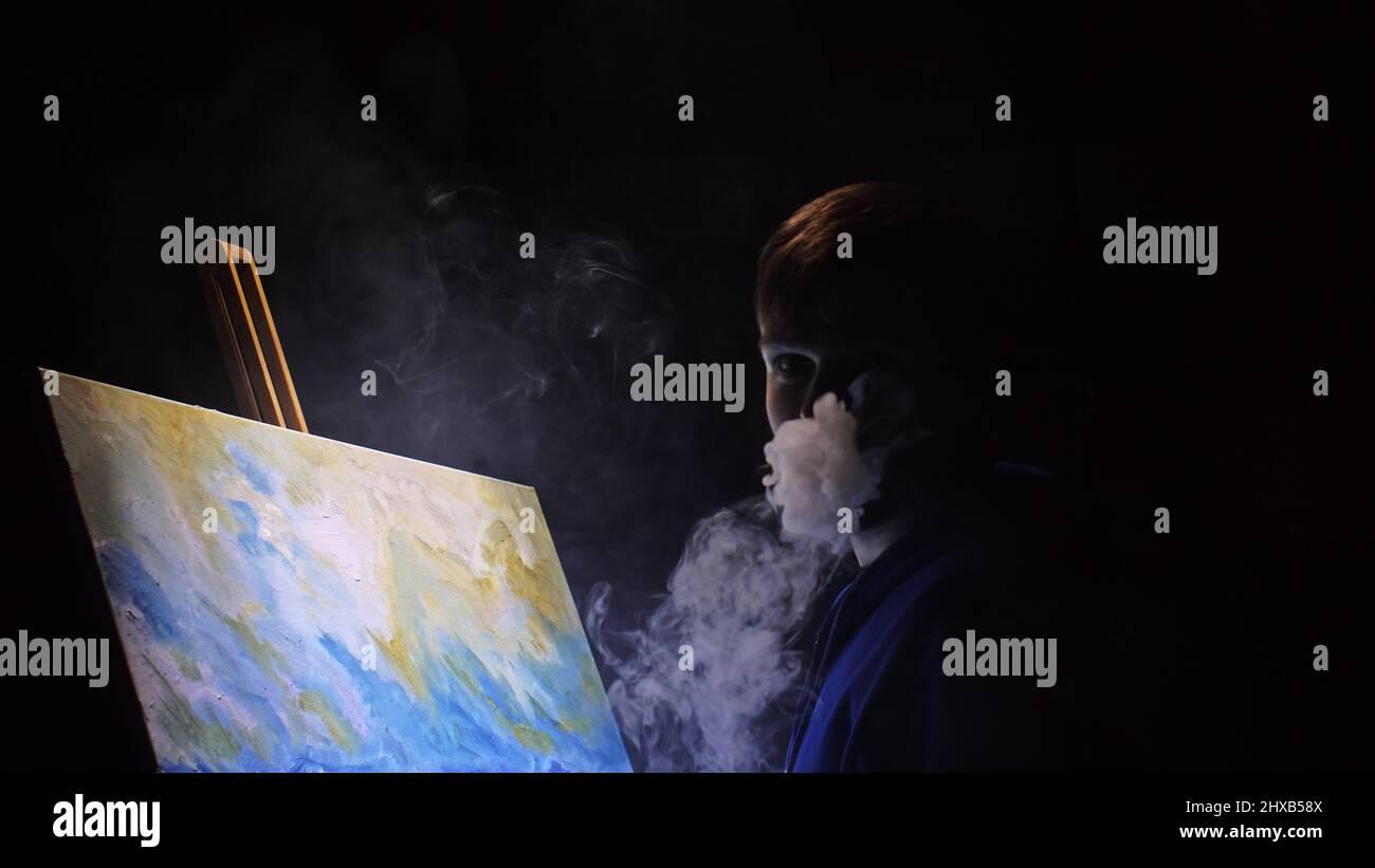 Artist copyist paint seascape with ship in ocean. Vaper smoke vape e ...