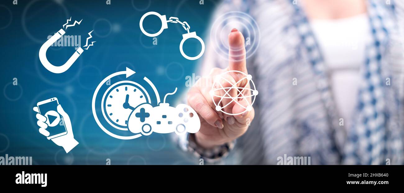 Woman touching a video game addiction concept on a touch screen with ...