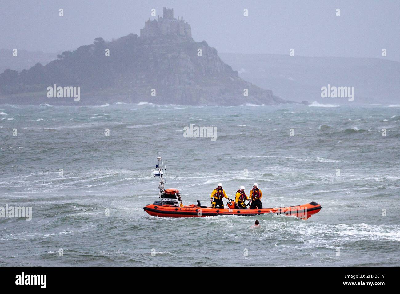 Penlee inshore lifeboat rescues a man from the sea off St MichaelÕs ...