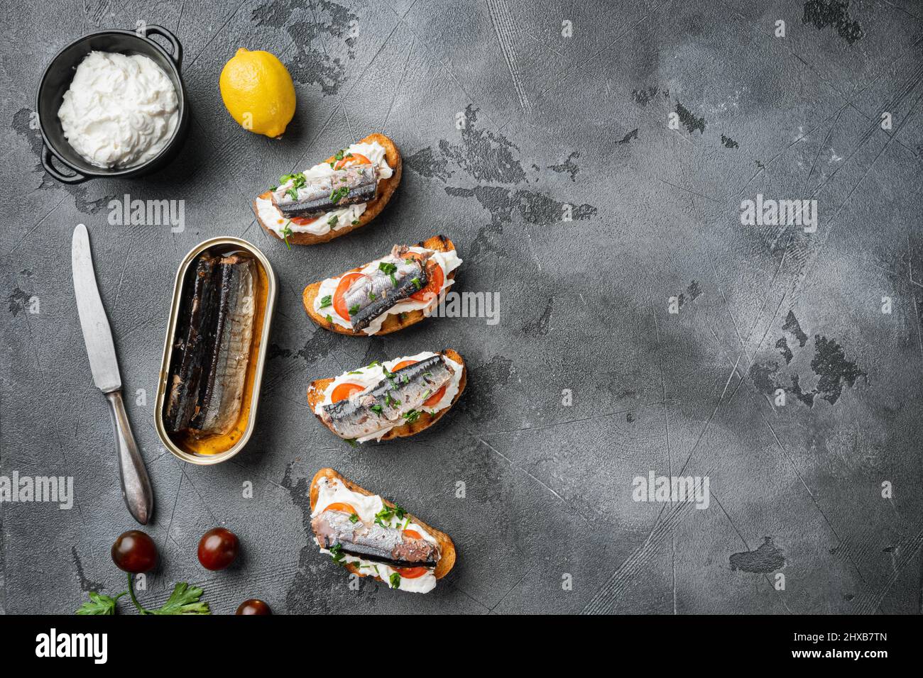 Homemade sardine sandwiches with Ricotta set, on gray stone table ...